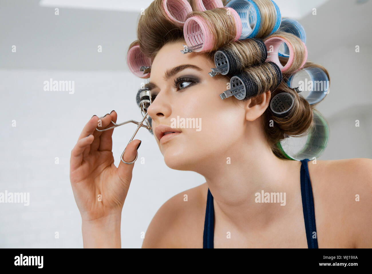 Woman in curlers applying hi-res stock photography and images - Alamy