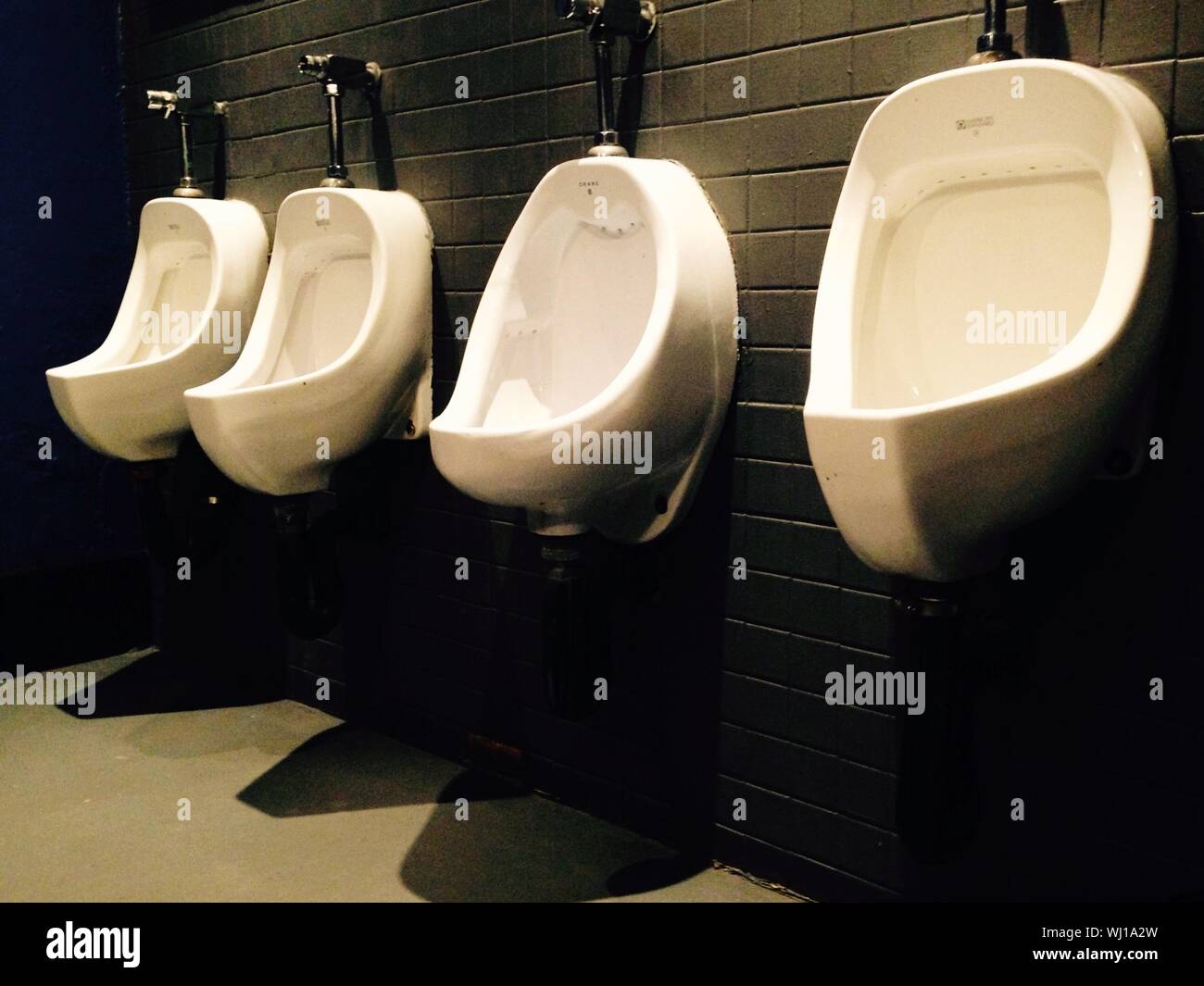 Public urinal hi-res stock photography and images - Alamy