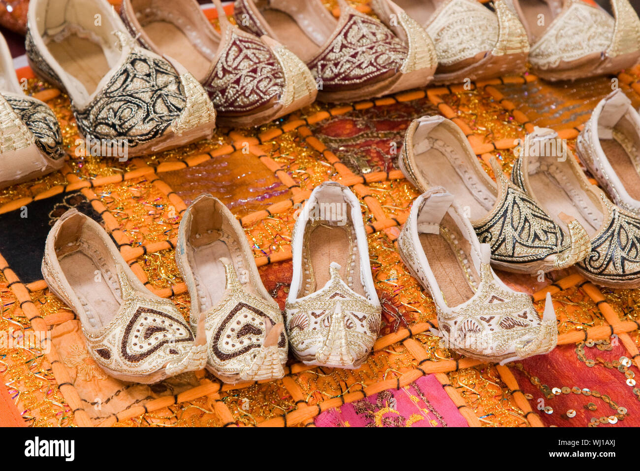 Dubai, UAE, Genie style sandals are for sale in the Bur Dubai souq in ...