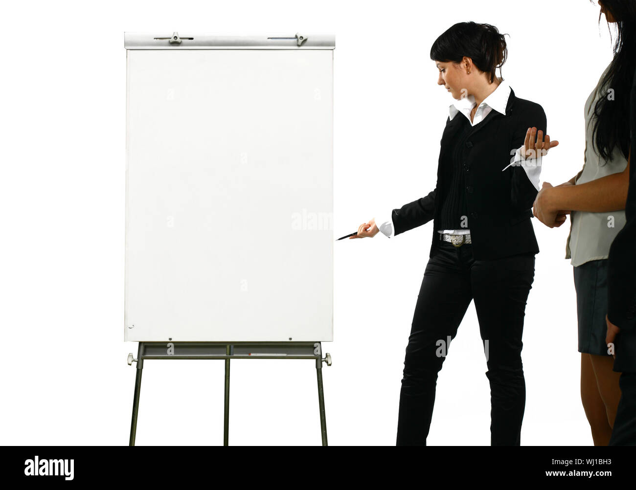The business girl shows something on a board Stock Photo - Alamy