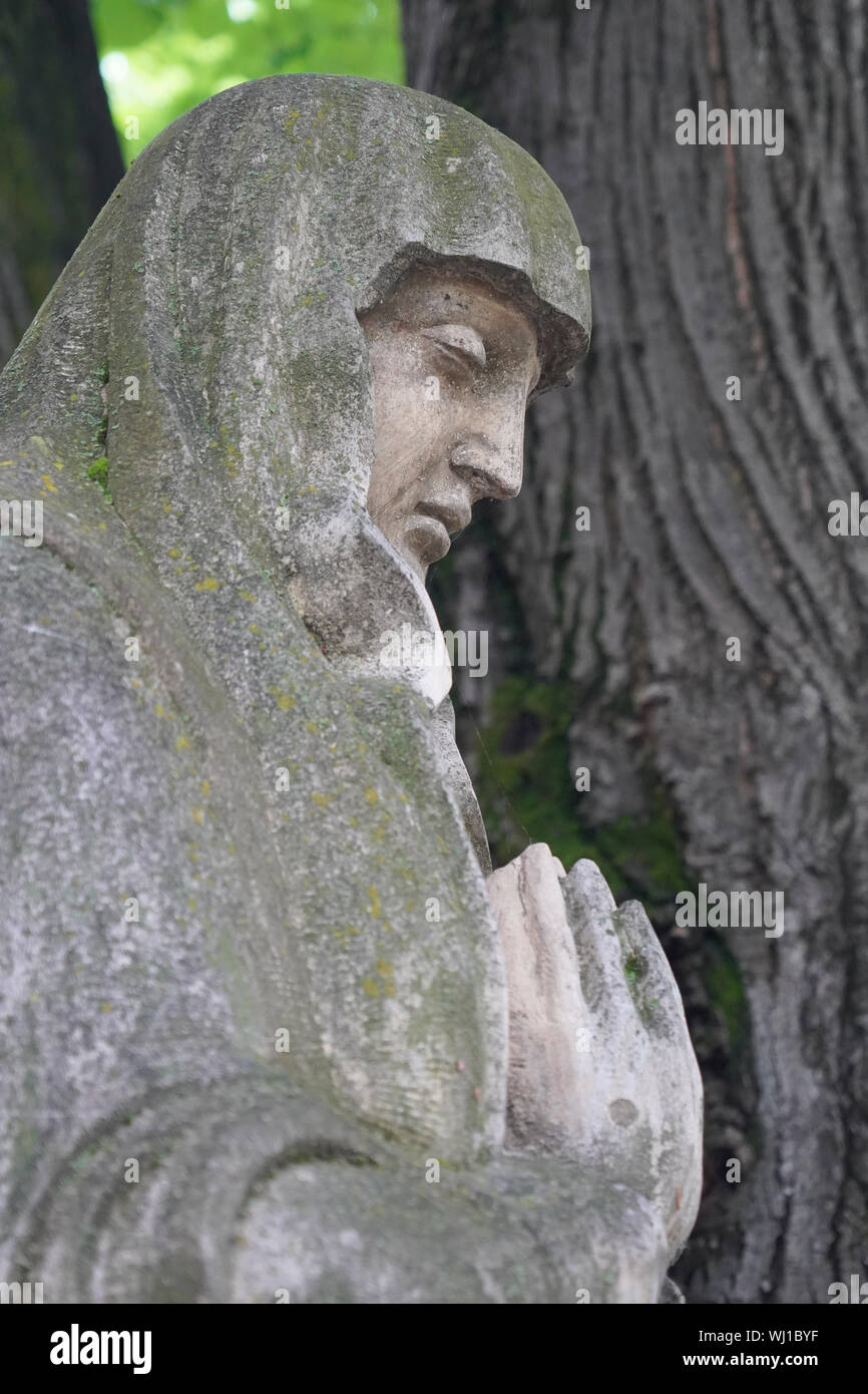mourning angel statue at Serban Voda cemetery (commonly known as Bellu ...