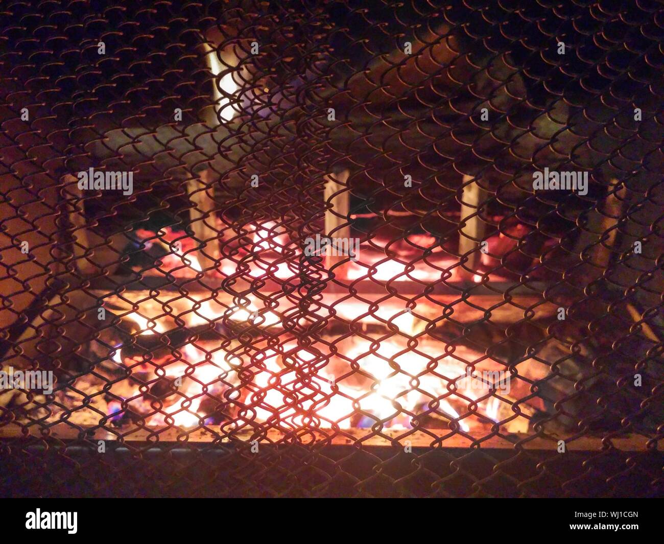 Fire with grate hi-res stock photography and images - Alamy