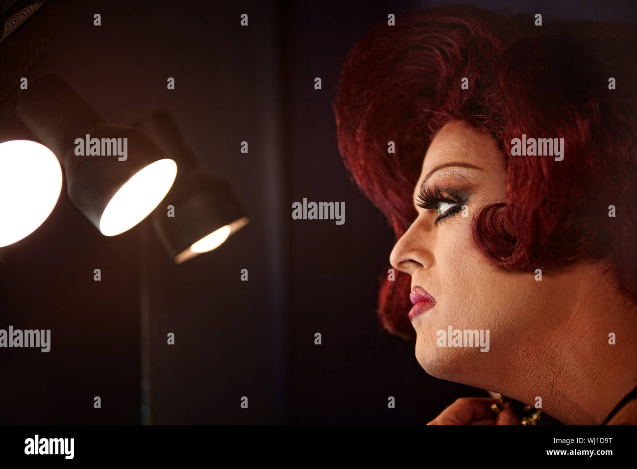Big beautiful Caucasian drag queen with lights Stock Photo - Alamy
