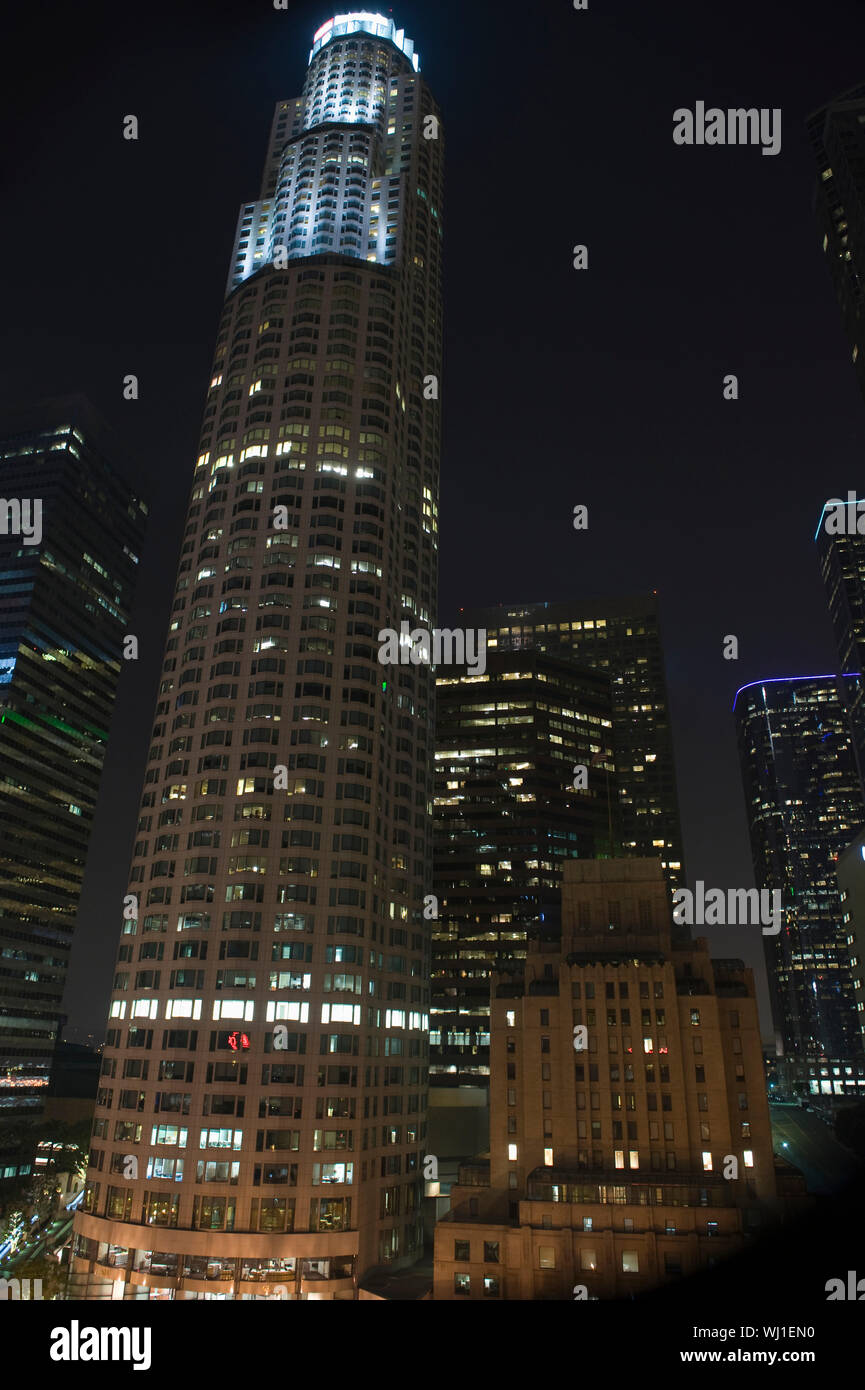 Multiple illuminated tall buildings of downtown at night Stock Photo ...