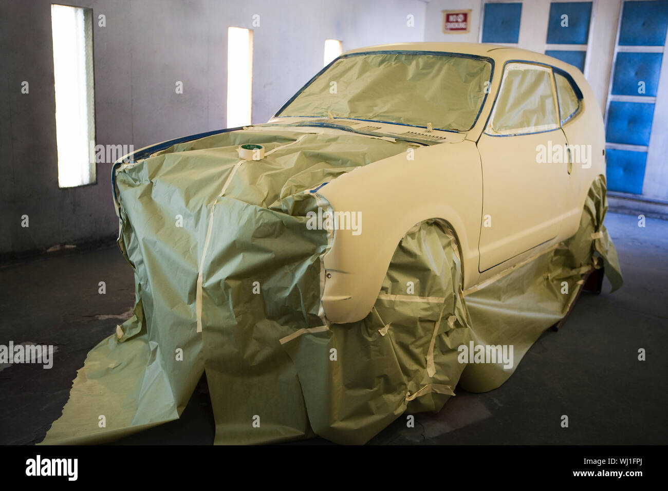 View of a newly painted car in garage Stock Photo - Alamy