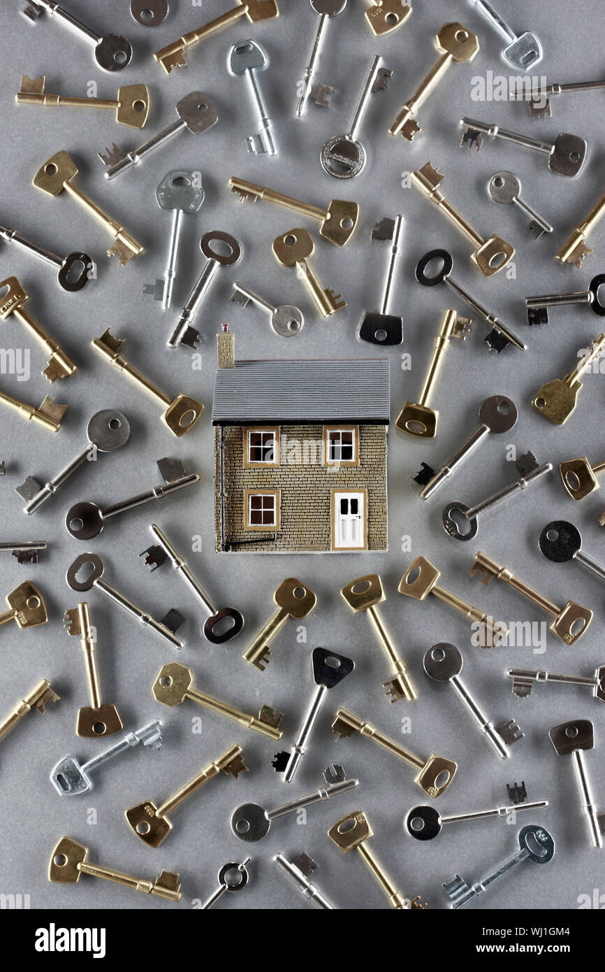 Model house and large group of keys Stock Photo - Alamy