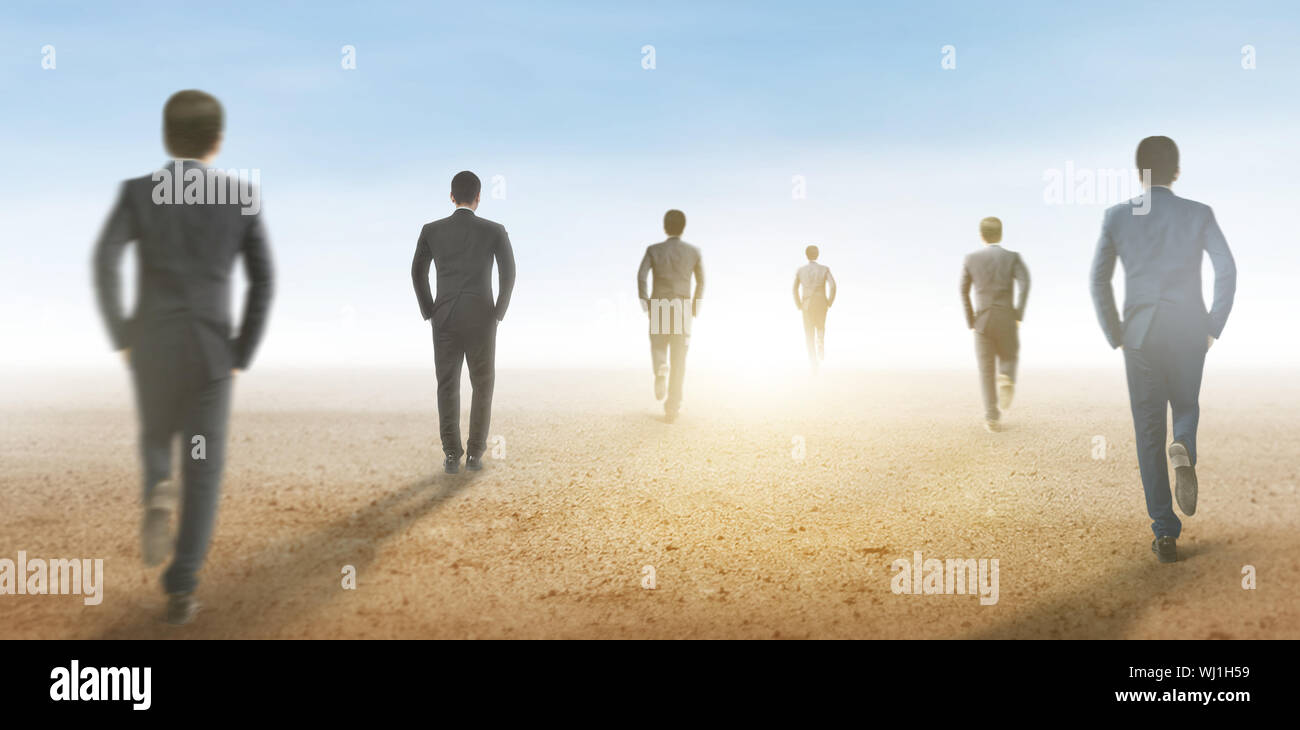 Silhouette of business man walk with confidence Stock Photo - Alamy