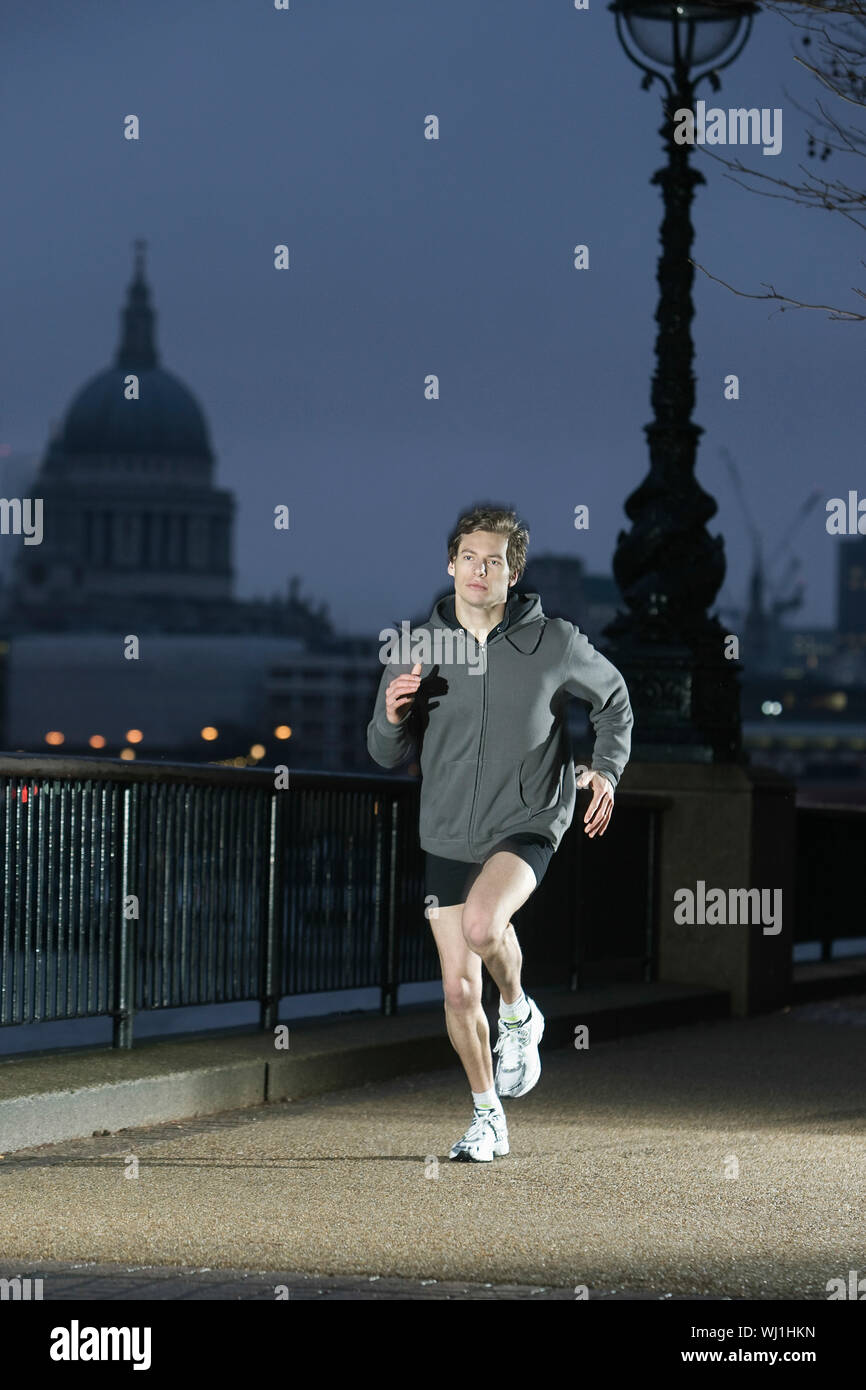 One man running city uk hi-res stock photography and images - Alamy