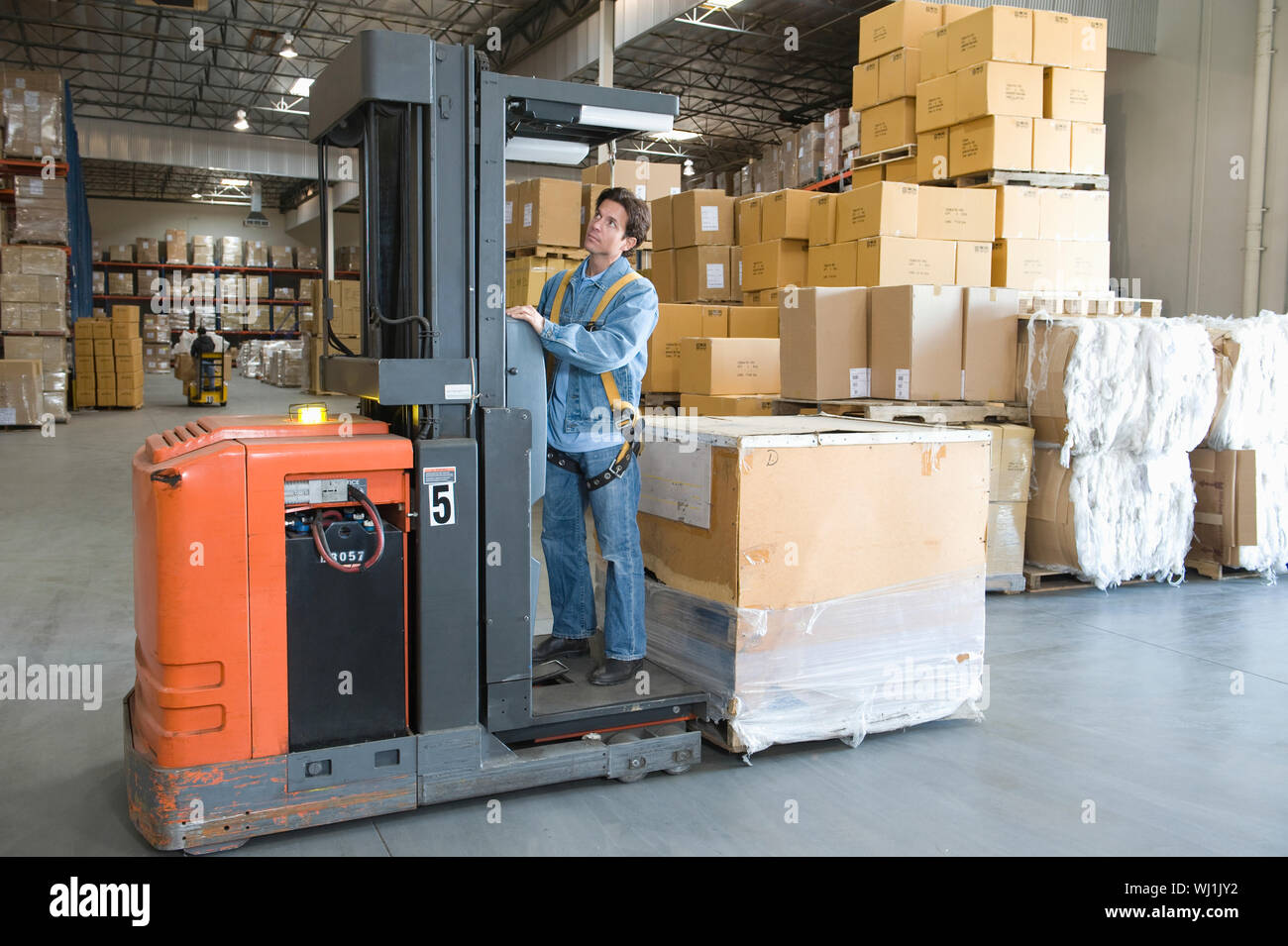 Worker operating a forklift hi-res stock photography and images - Alamy
