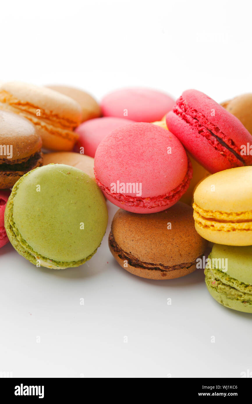 Colorful macaroons on white background Stock Photo - Alamy