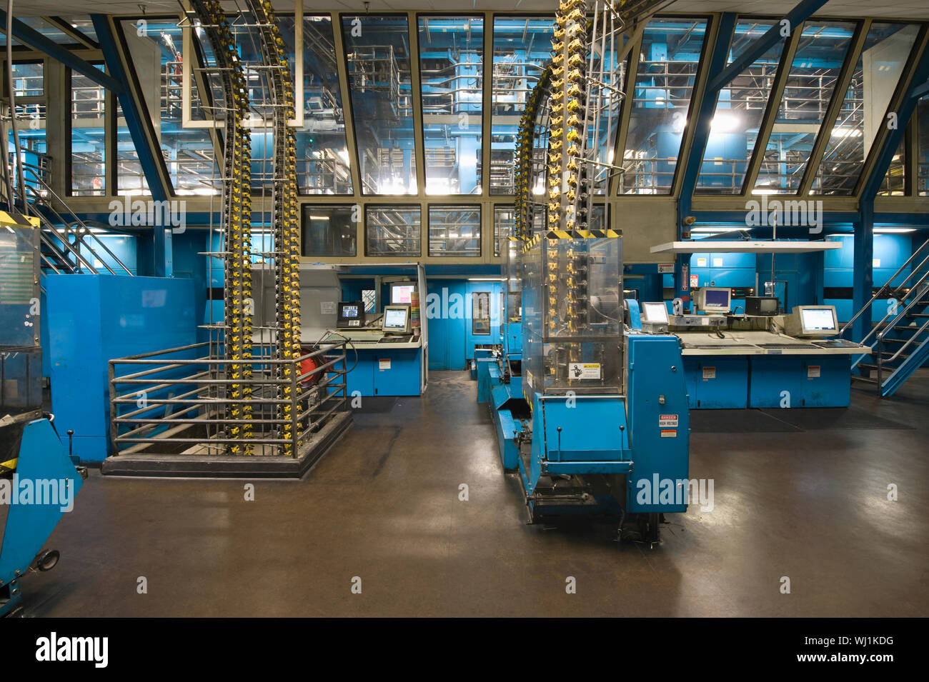 Interior view of a spacious newspaper factory Stock Photo - Alamy