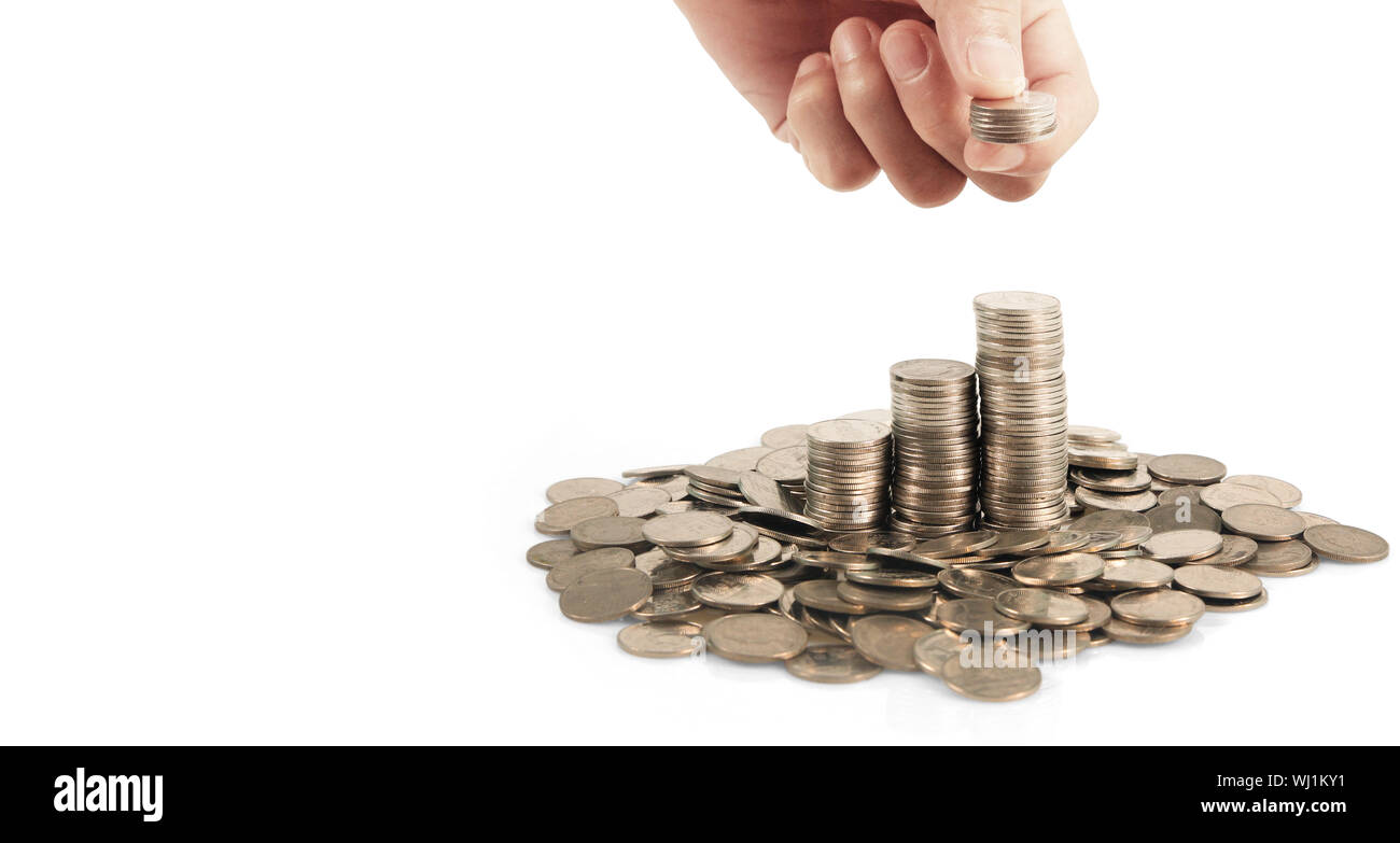 Coins placed on top. While a men's hand pouring coins Stock Photo - Alamy