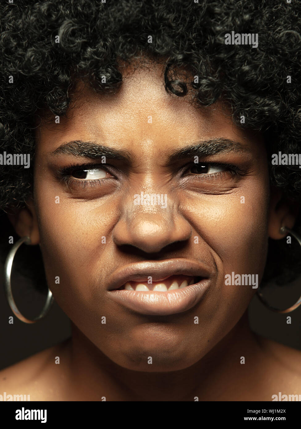 Close up portrait of young, emotional african-american woman. Highly ...