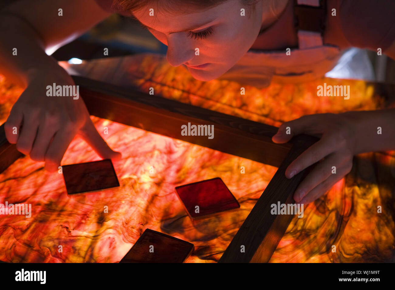 Closeup of a female artist producing textiles Stock Photo - Alamy