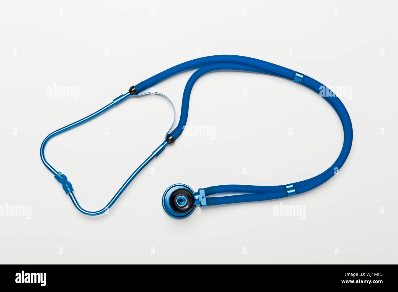 Blue stethoscope isolated over white background Stock Photo - Alamy