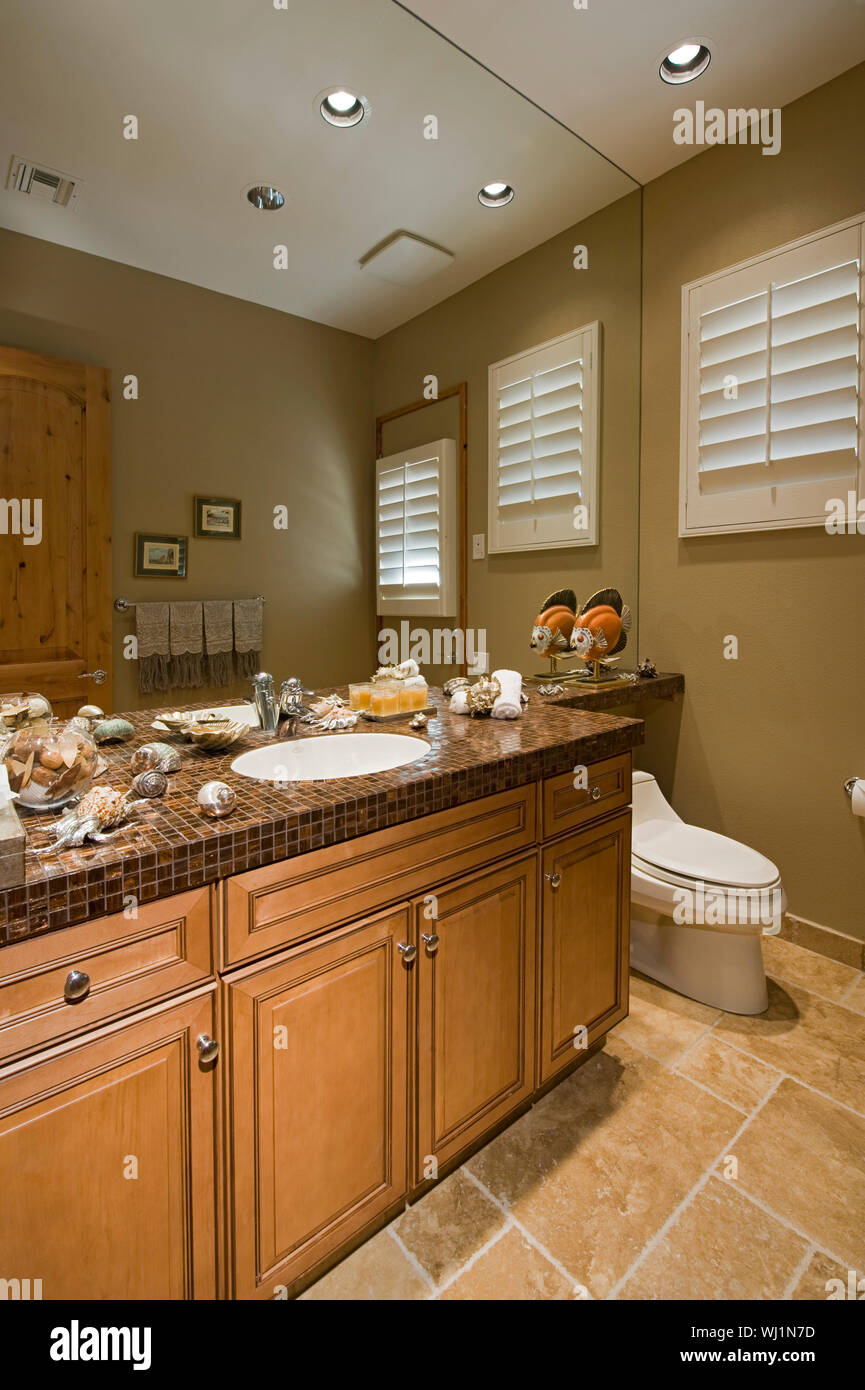 View of a toilet by sink in the bathroom Stock Photo - Alamy