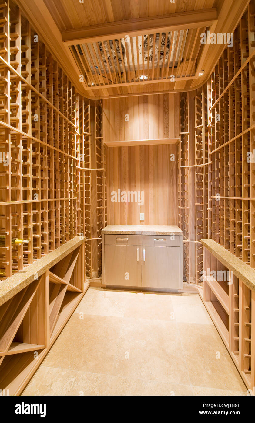 View of empty wooden racks in wine cellar Stock Photo - Alamy