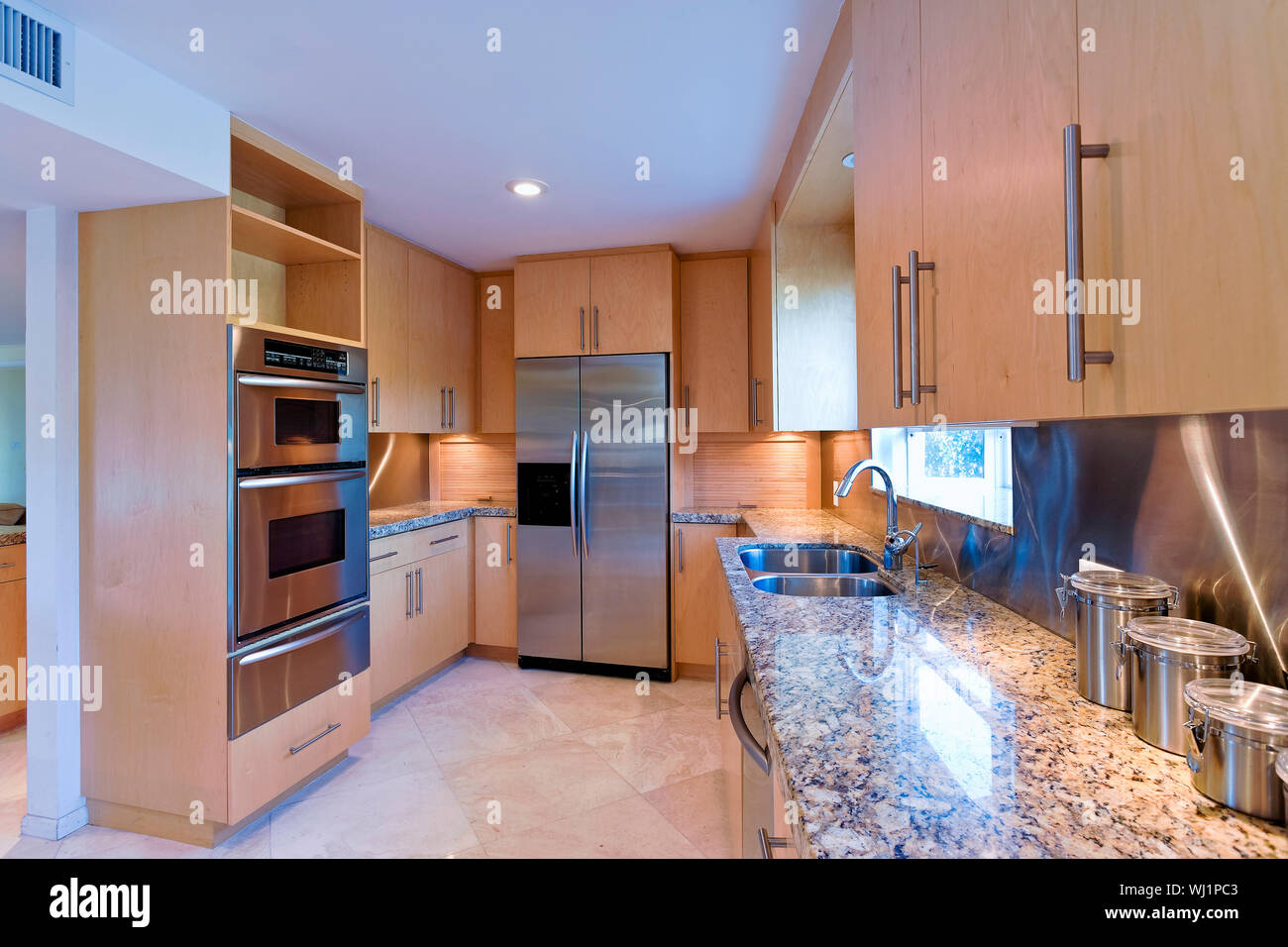 View of a modern kitchen in a house Stock Photo - Alamy
