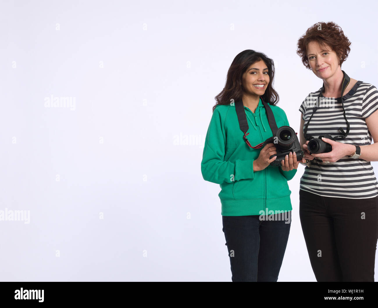 Two digital cameras isolated hi-res stock photography and images - Alamy