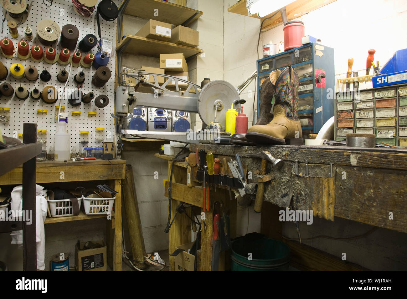 View of a traditional shoemaker workshop Stock Photo - Alamy
