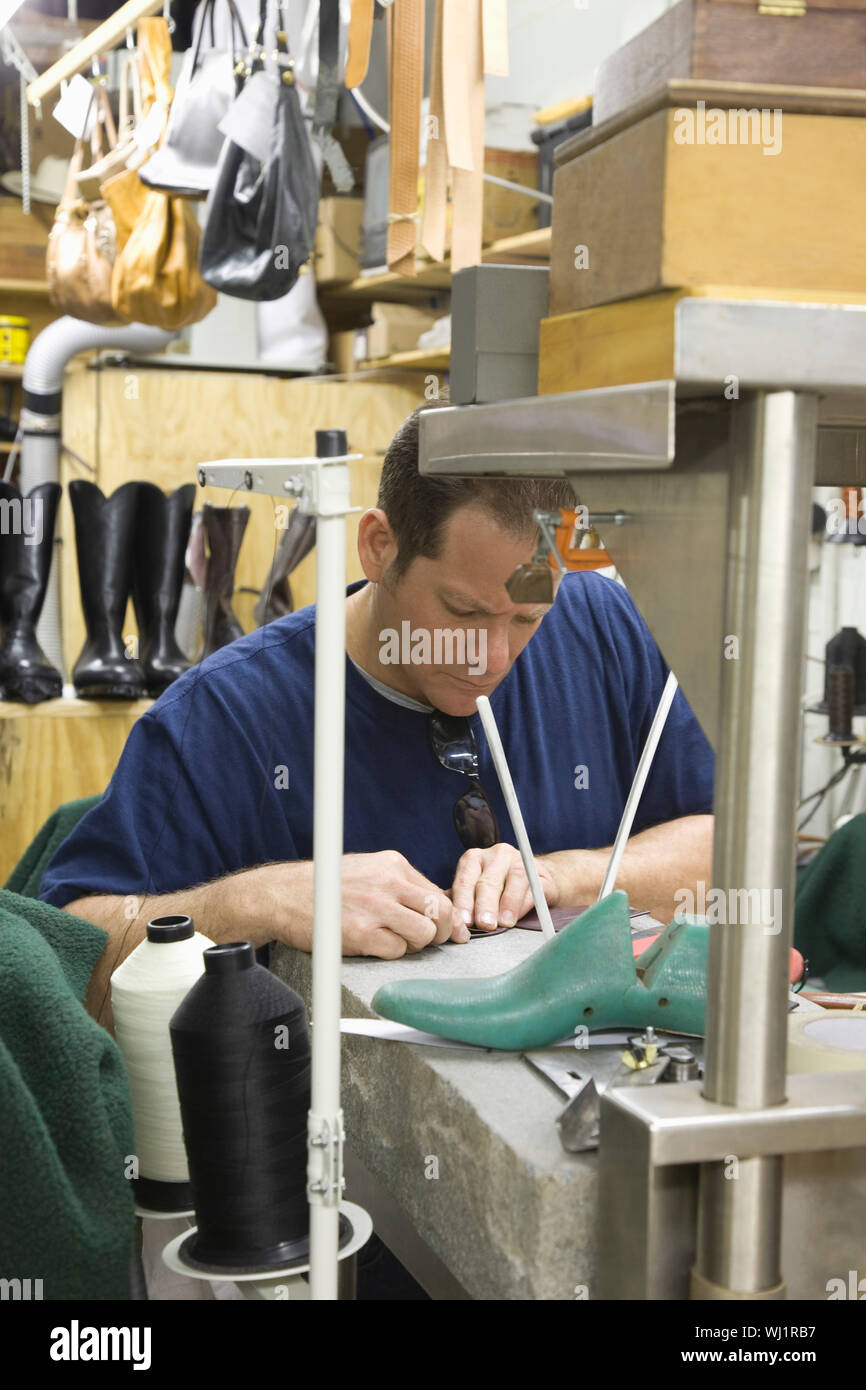 Male shoemaker at work in traditional workshop Stock Photo - Alamy
