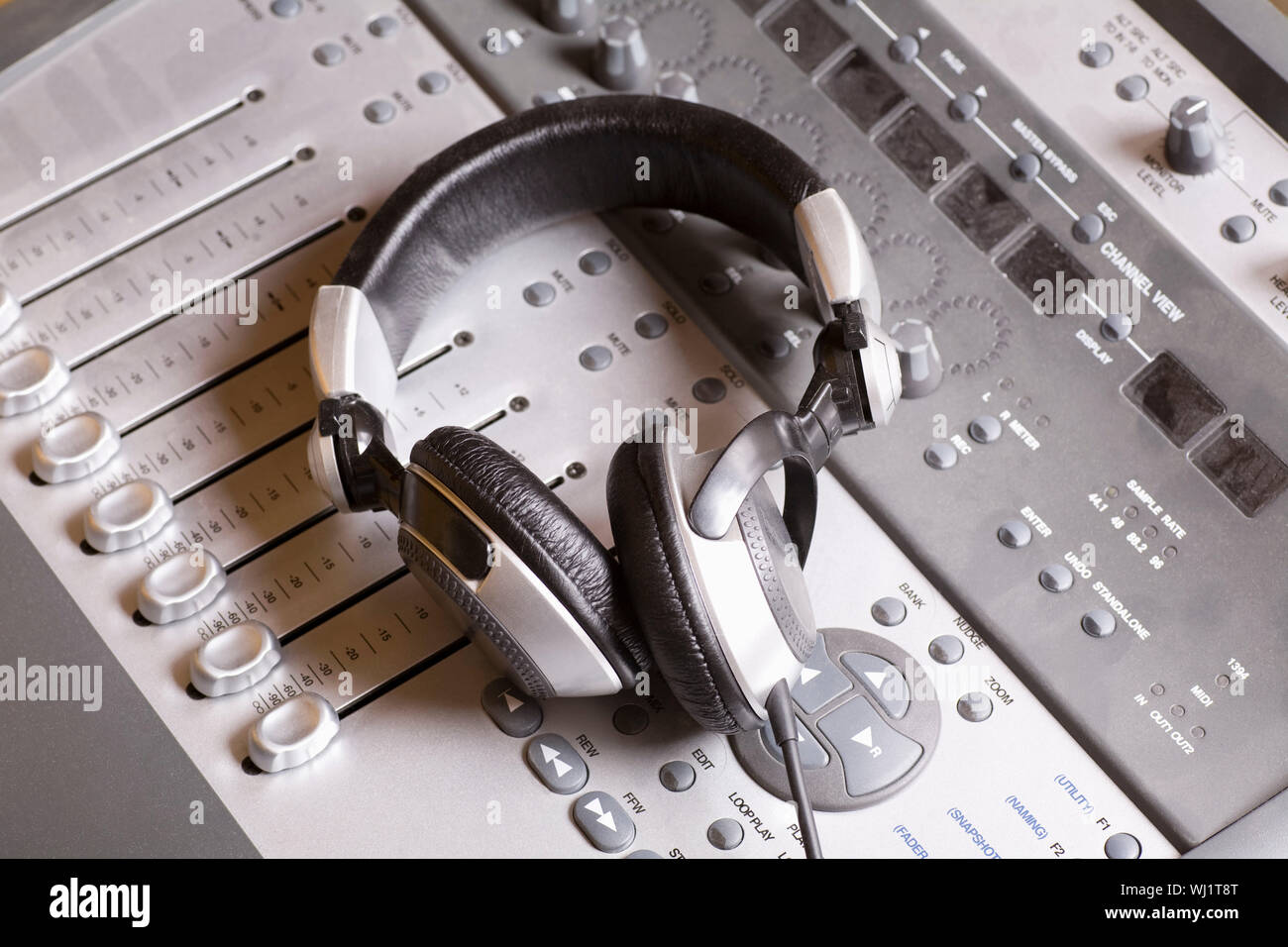 Mixing console and headphones Stock Photo - Alamy