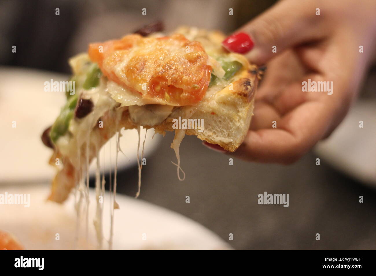 Hand Taking Pizza Slice High Resolution Stock Photography and Images ...