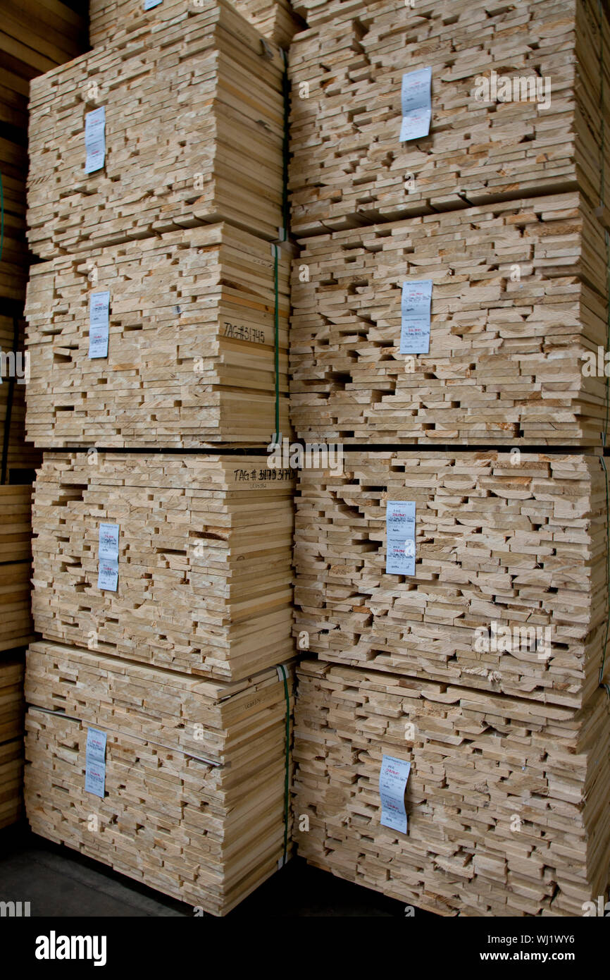 Close-up of stacks of plywood in warehouse Stock Photo - Alamy