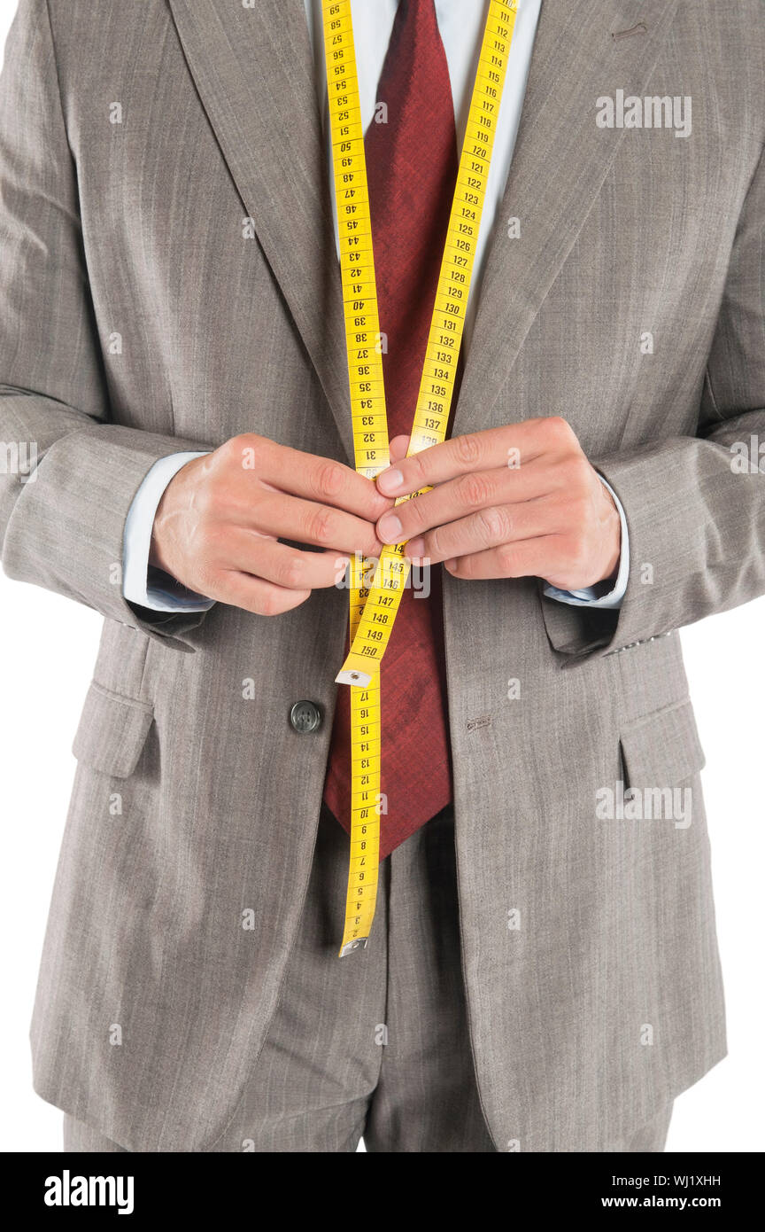 Man wearing a tape measure across his suit Stock Photo - Alamy