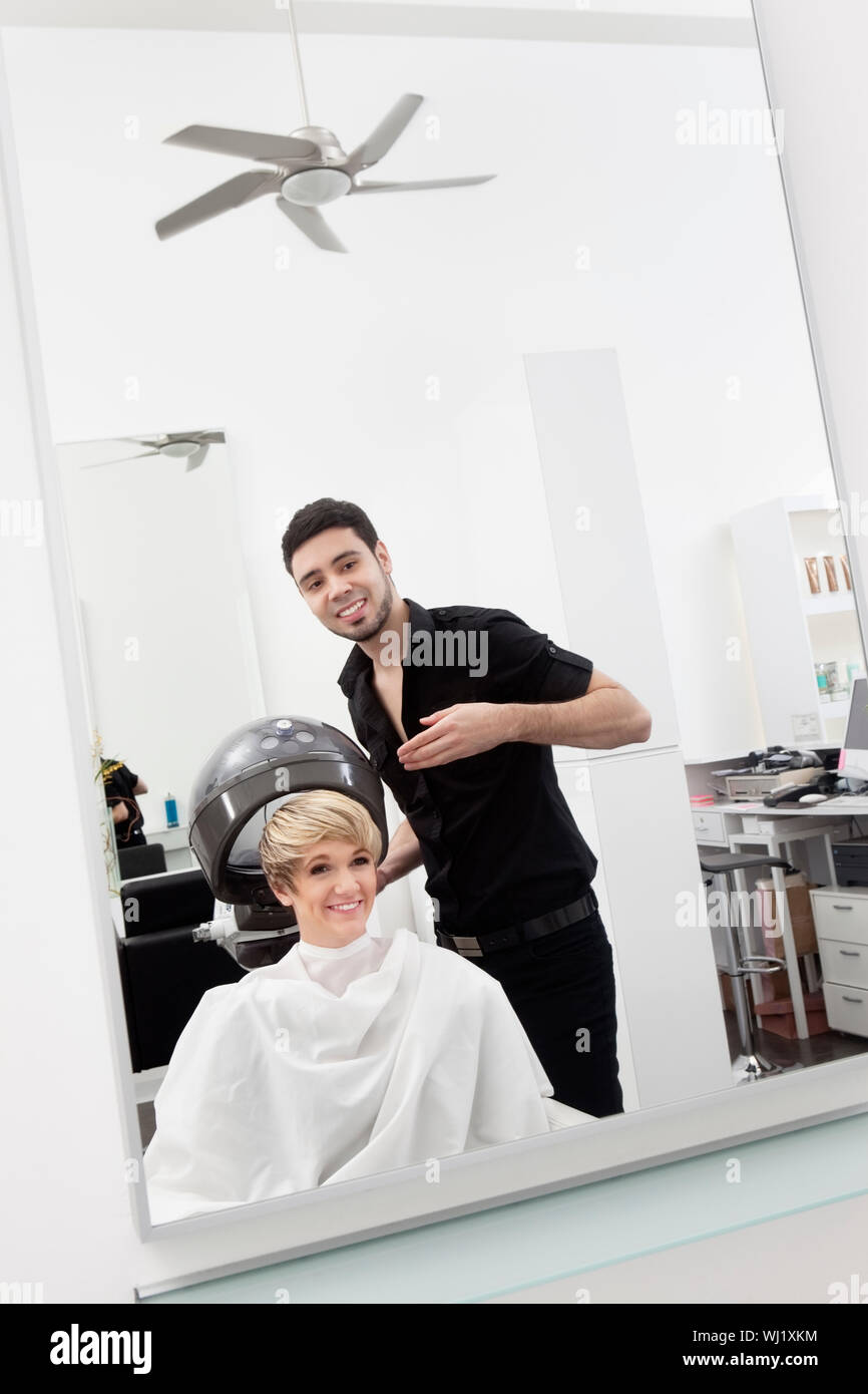 Woman under hair dryer hi-res stock photography and images - Alamy