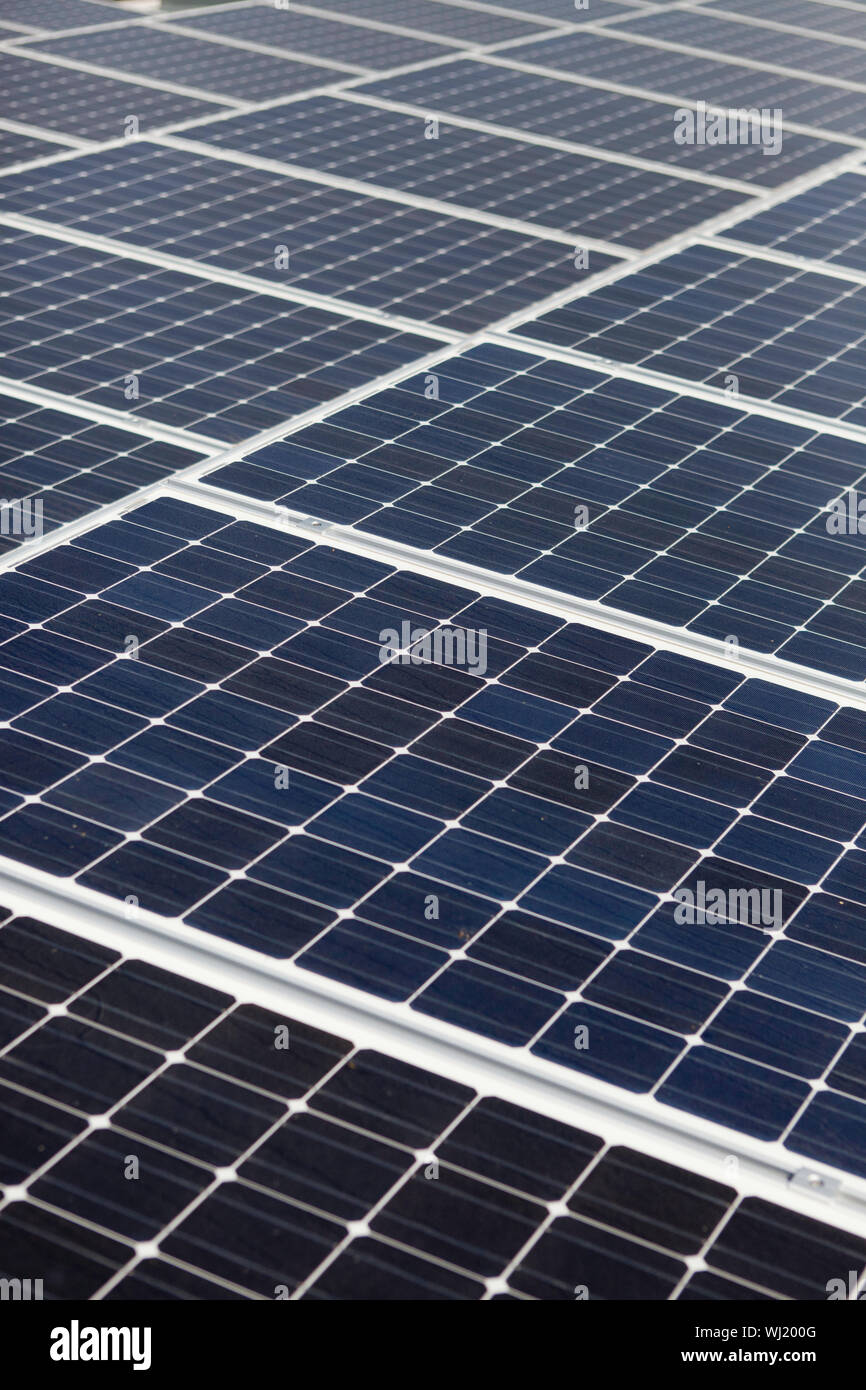 Diagonal line of solar array Stock Photo - Alamy
