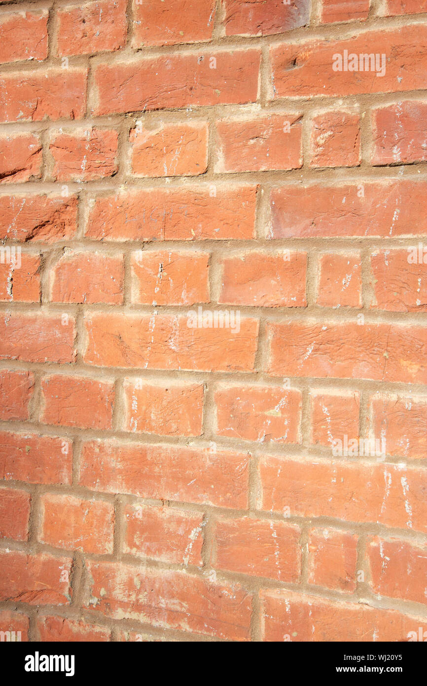 Close-up of reddish-brown brick wall Stock Photo - Alamy