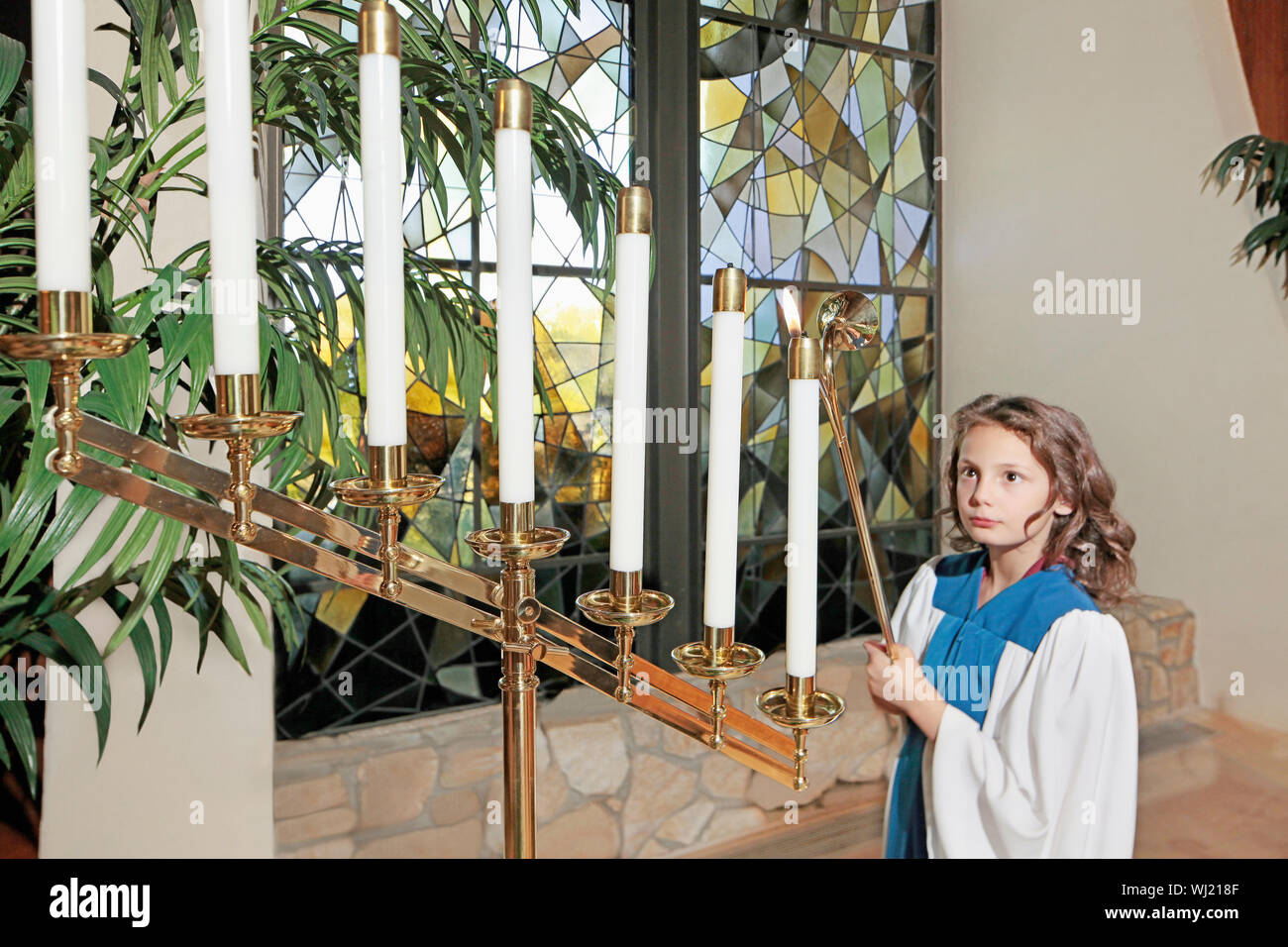 Young girl in the church Stock Photo - Alamy