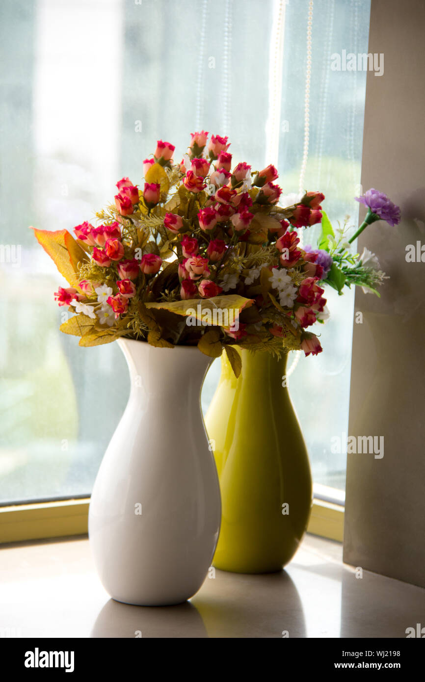 Vases on window sill hi-res stock photography and images - Alamy