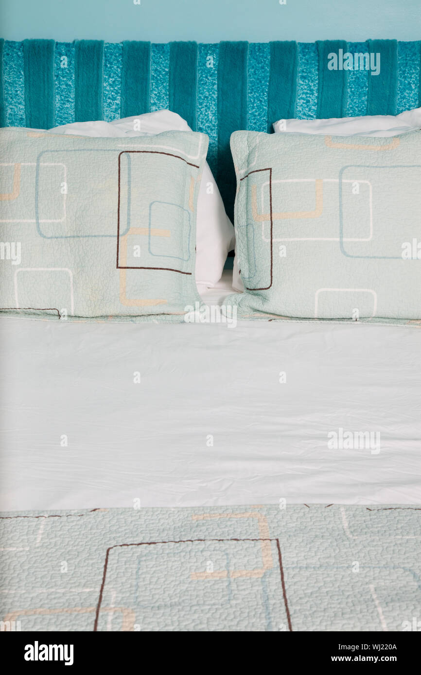 Close-up of neat and tidy bed with pillows Stock Photo - Alamy