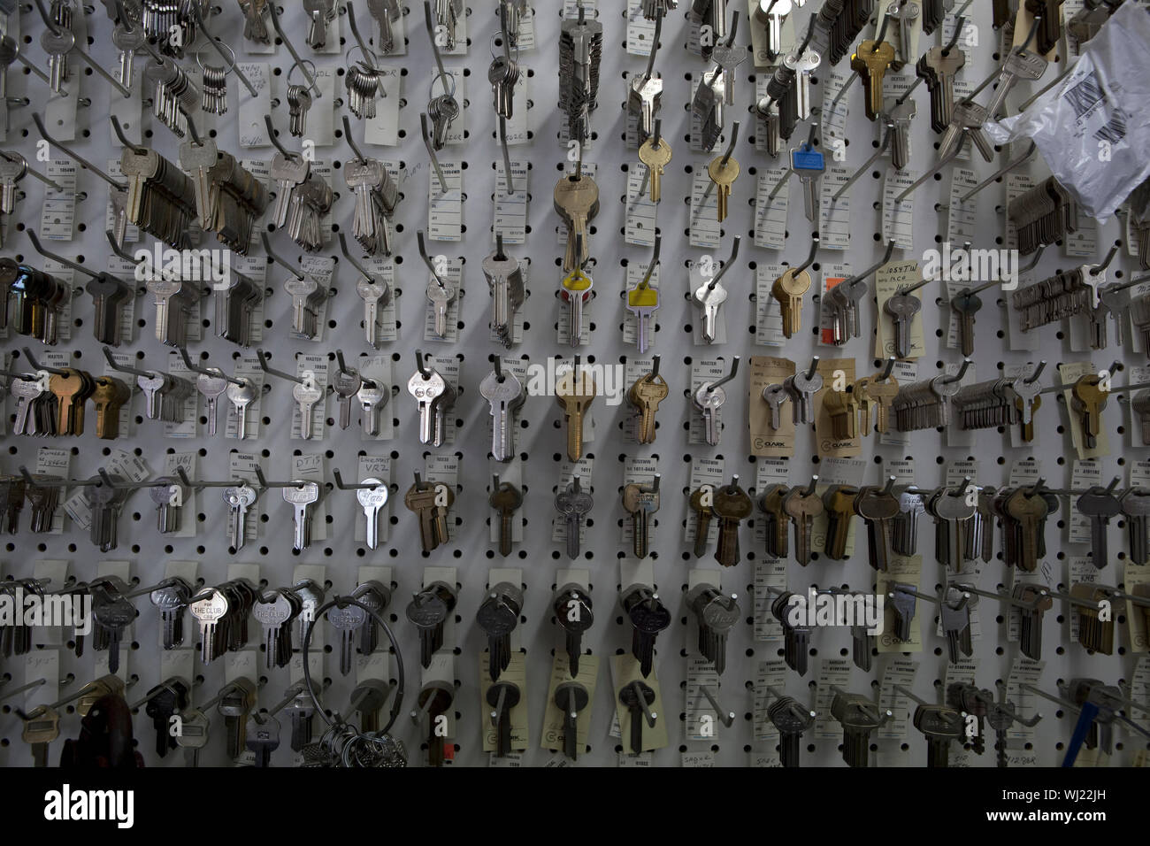 Large group of keys on display in store Stock Photo - Alamy