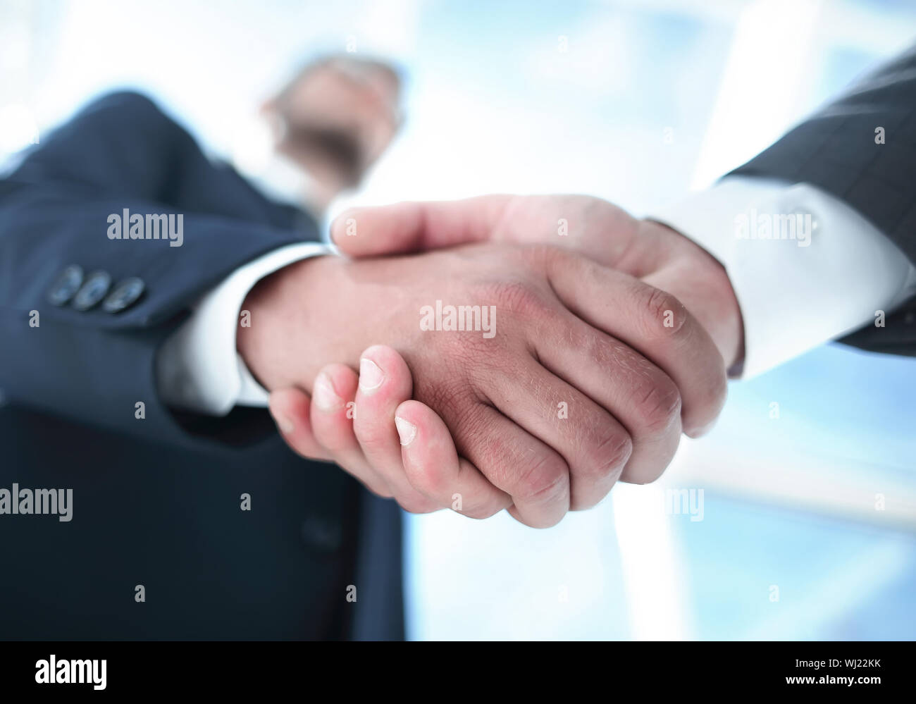 bottom view.handshake business people Stock Photo - Alamy