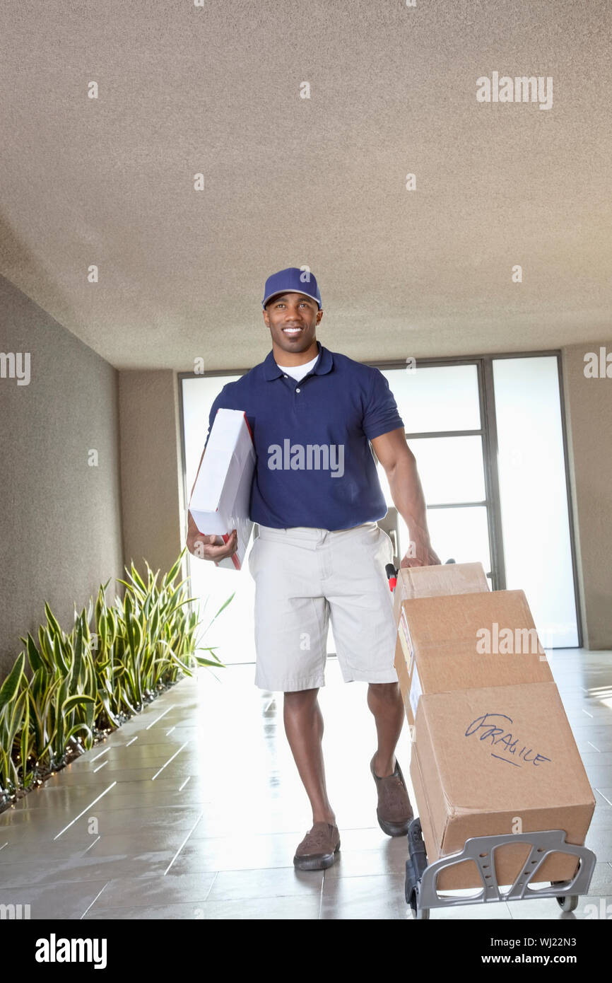 African american man packages hi-res stock photography and images - Alamy