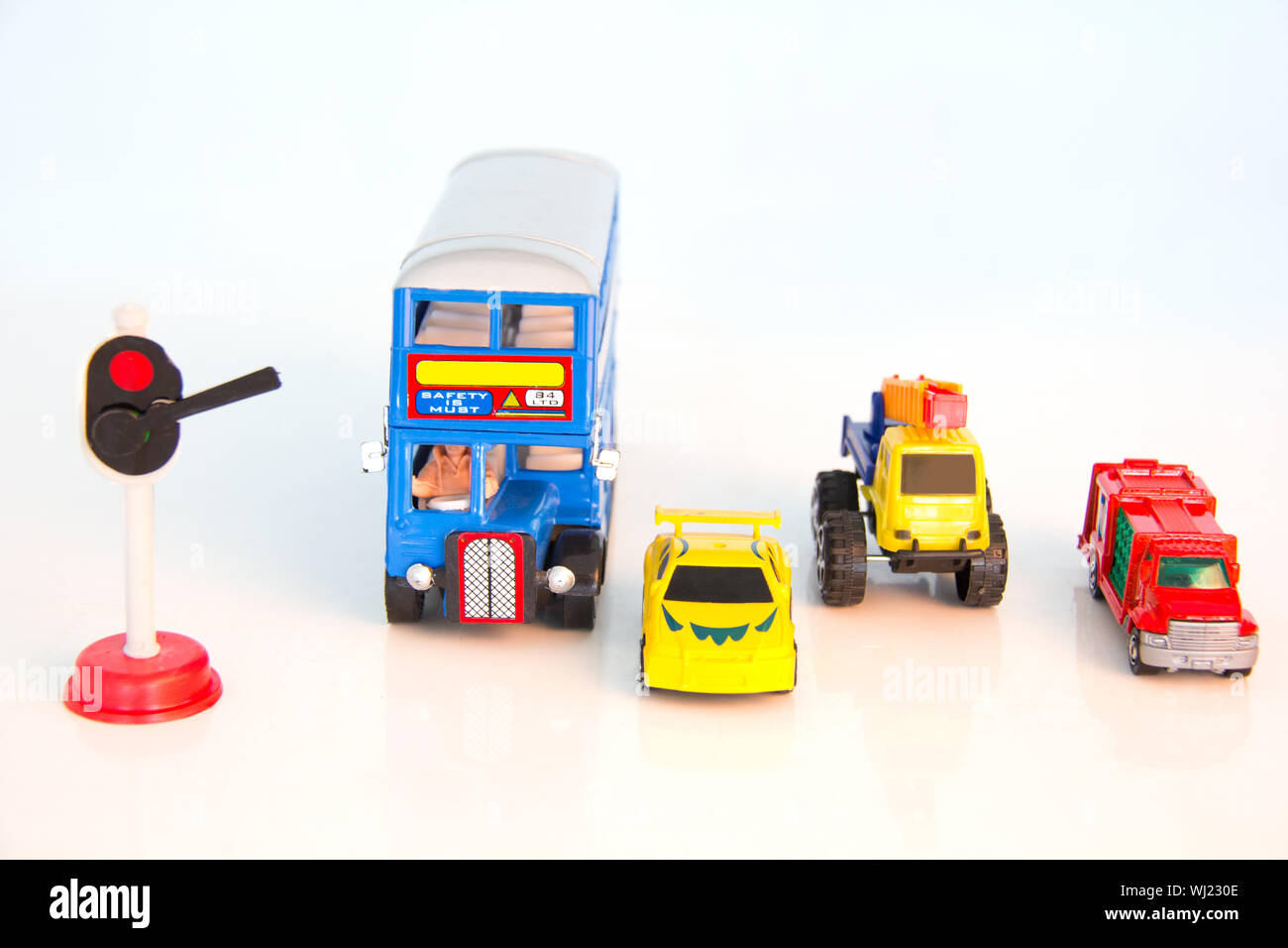 Toy cars waiting at traffic signal Stock Photo - Alamy