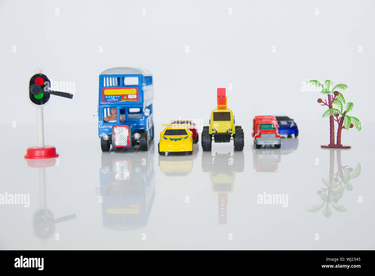 Toy cars waiting at traffic signal Stock Photo - Alamy