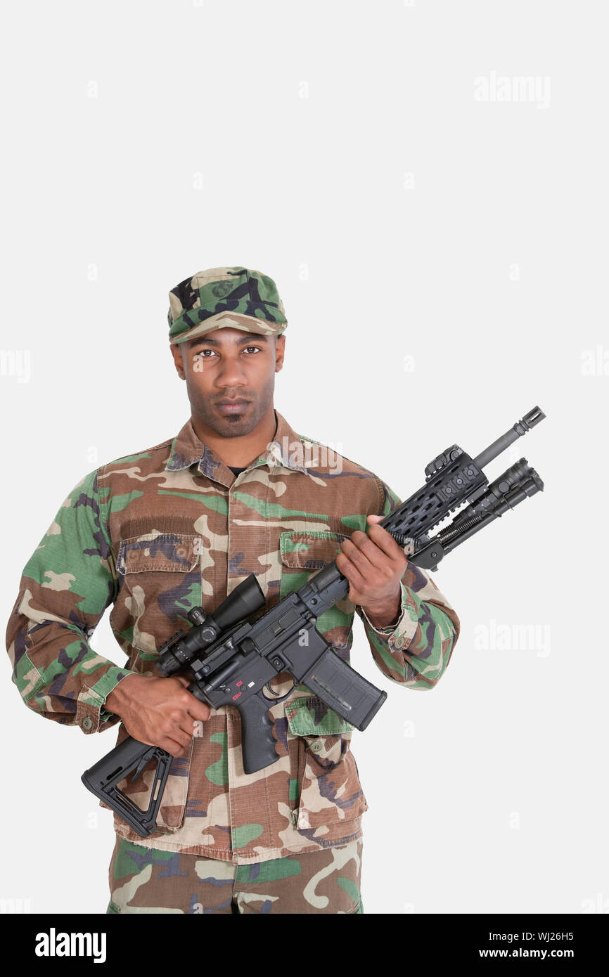African american soldier holding gun hi-res stock photography and ...