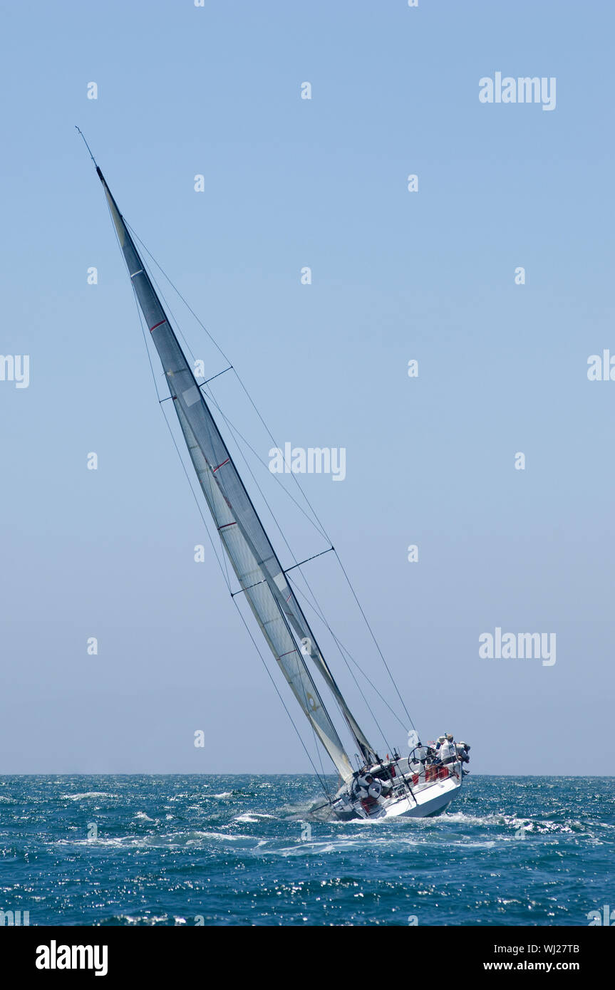 View of a yacht compete in team sailing event Stock Photo - Alamy