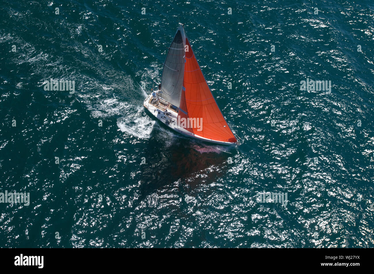 Elevated view of a yacht competing in team sailing event Stock Photo ...