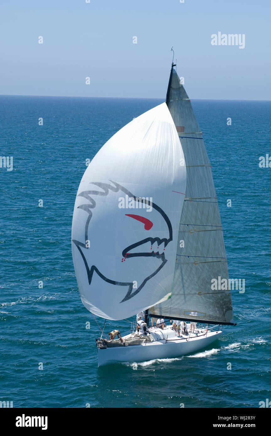View of a yacht competing in team sailing event Stock Photo - Alamy