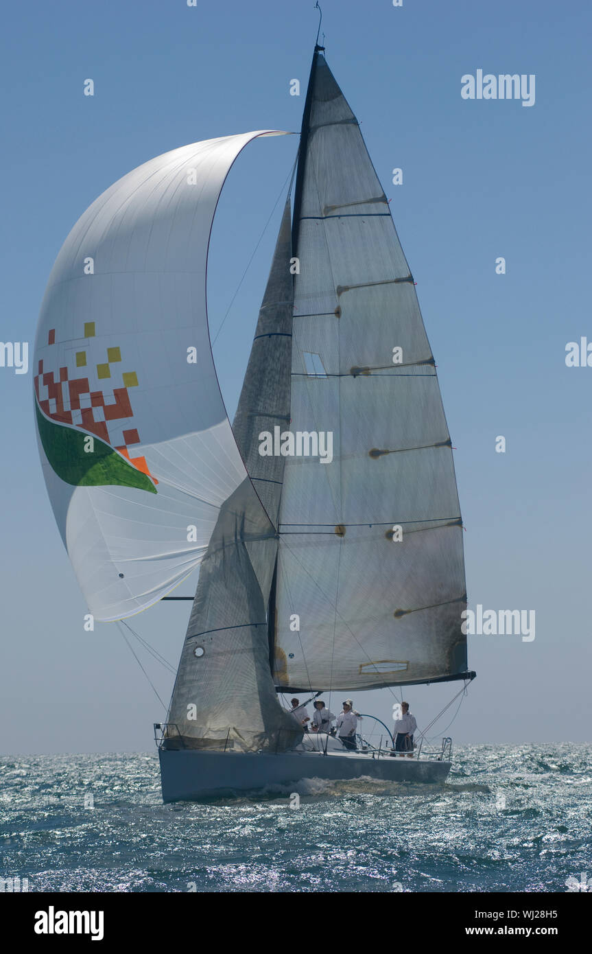 View of a yacht competing in team sailing event Stock Photo - Alamy