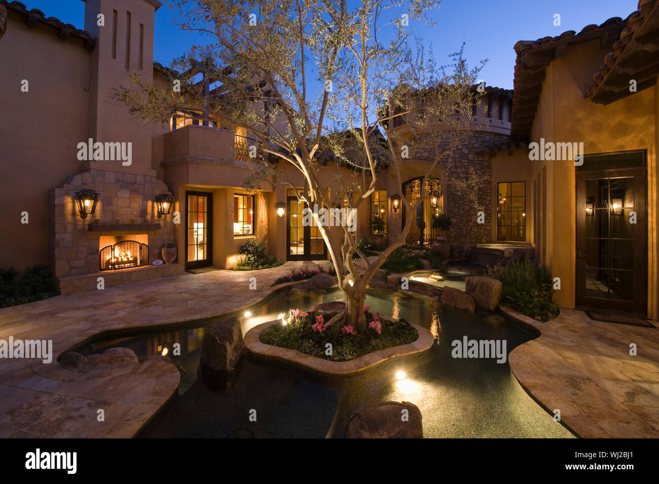 Tree against sky in courtyard hi-res stock photography and images - Alamy