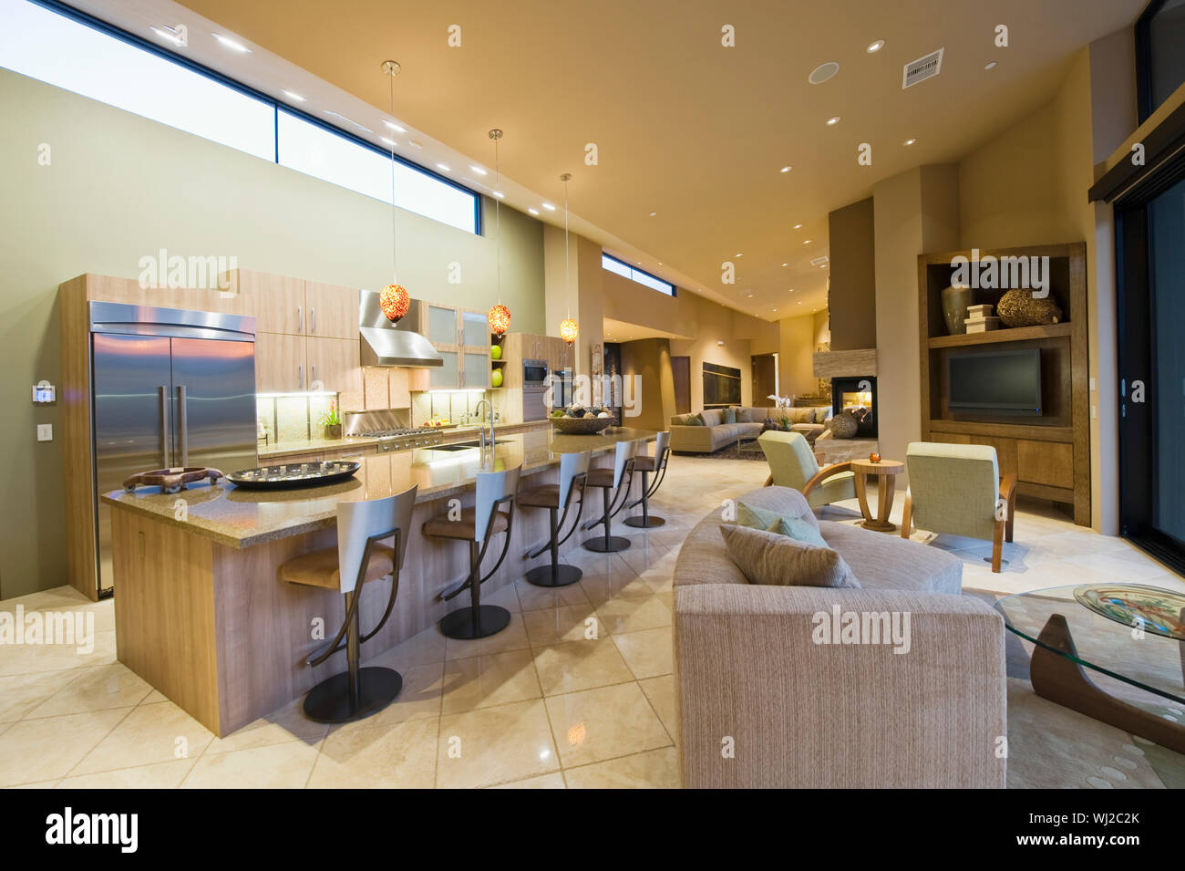 Entertainment area by kitchen with view of living room in the ...