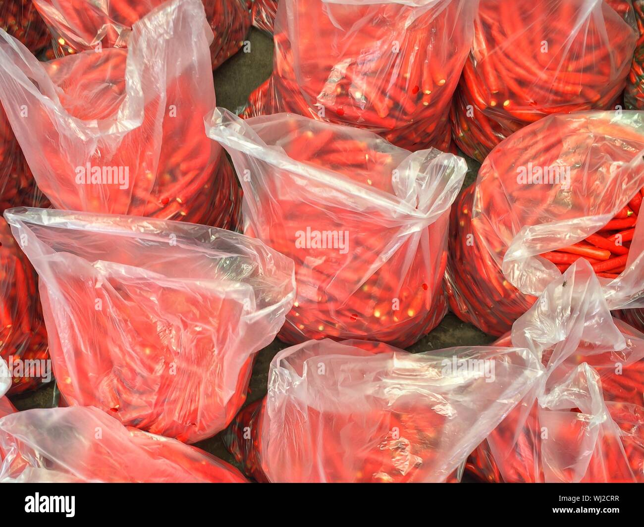 Red plastic bag hi-res stock photography and images - Alamy