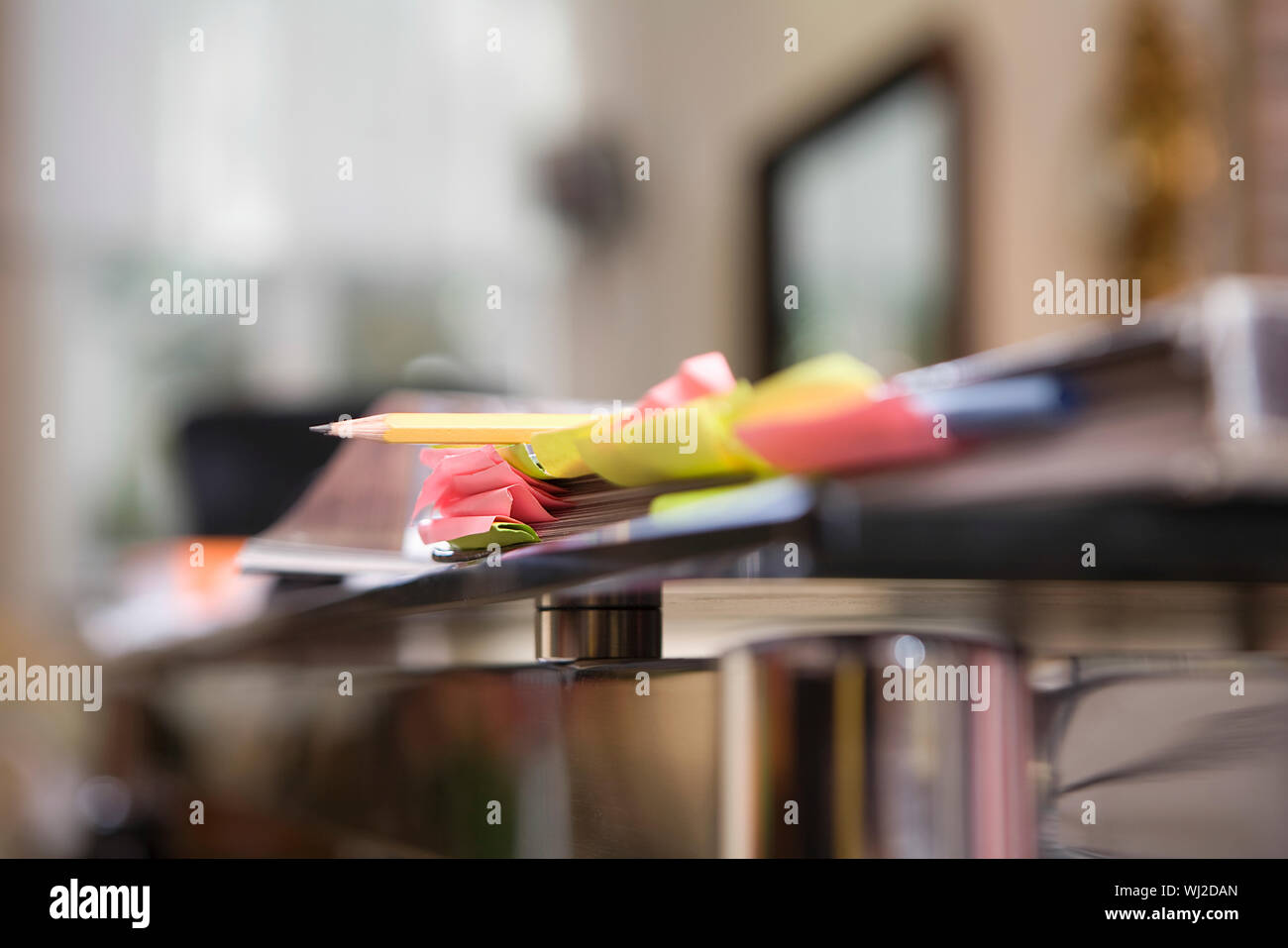 Sticky notes on design studio desk Stock Photo - Alamy