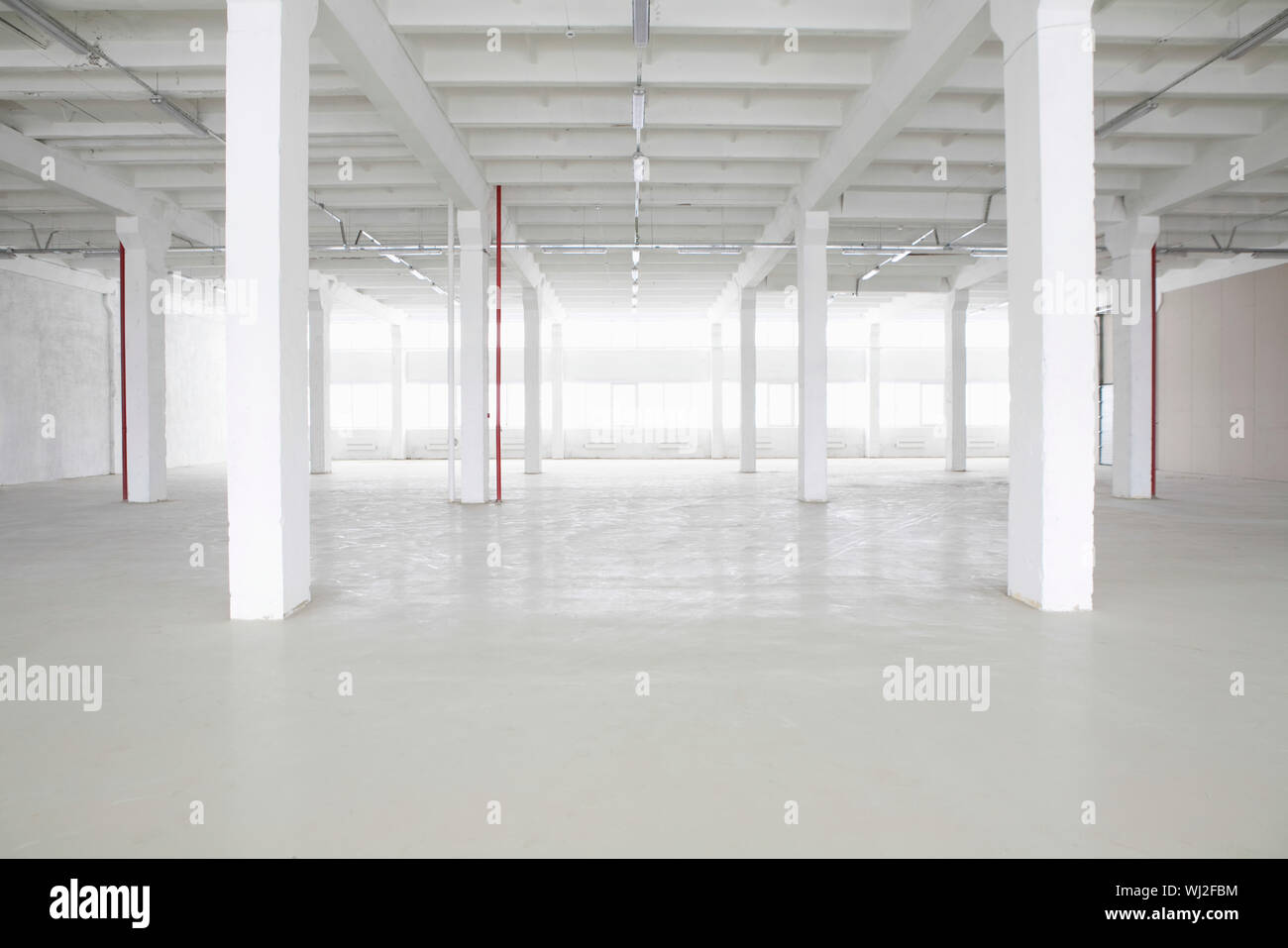 Large empty storehouse Stock Photo - Alamy